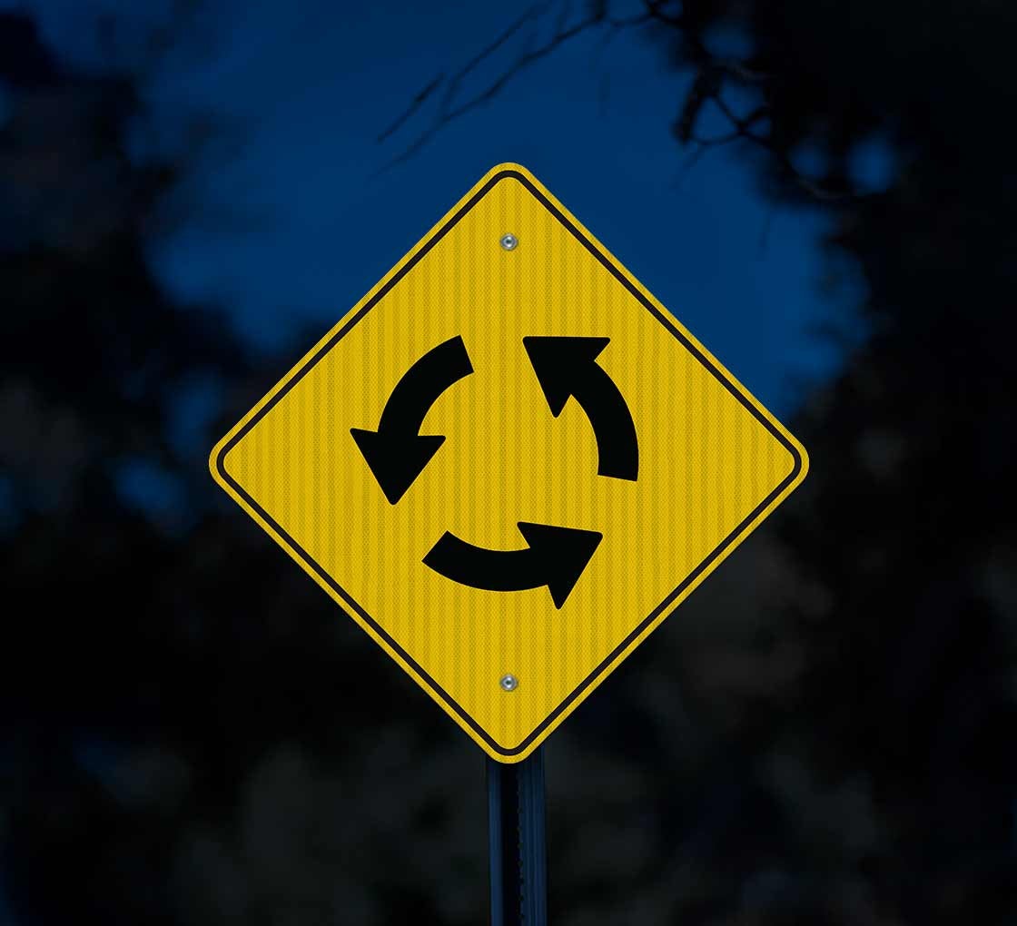 roundabout sign triangle
