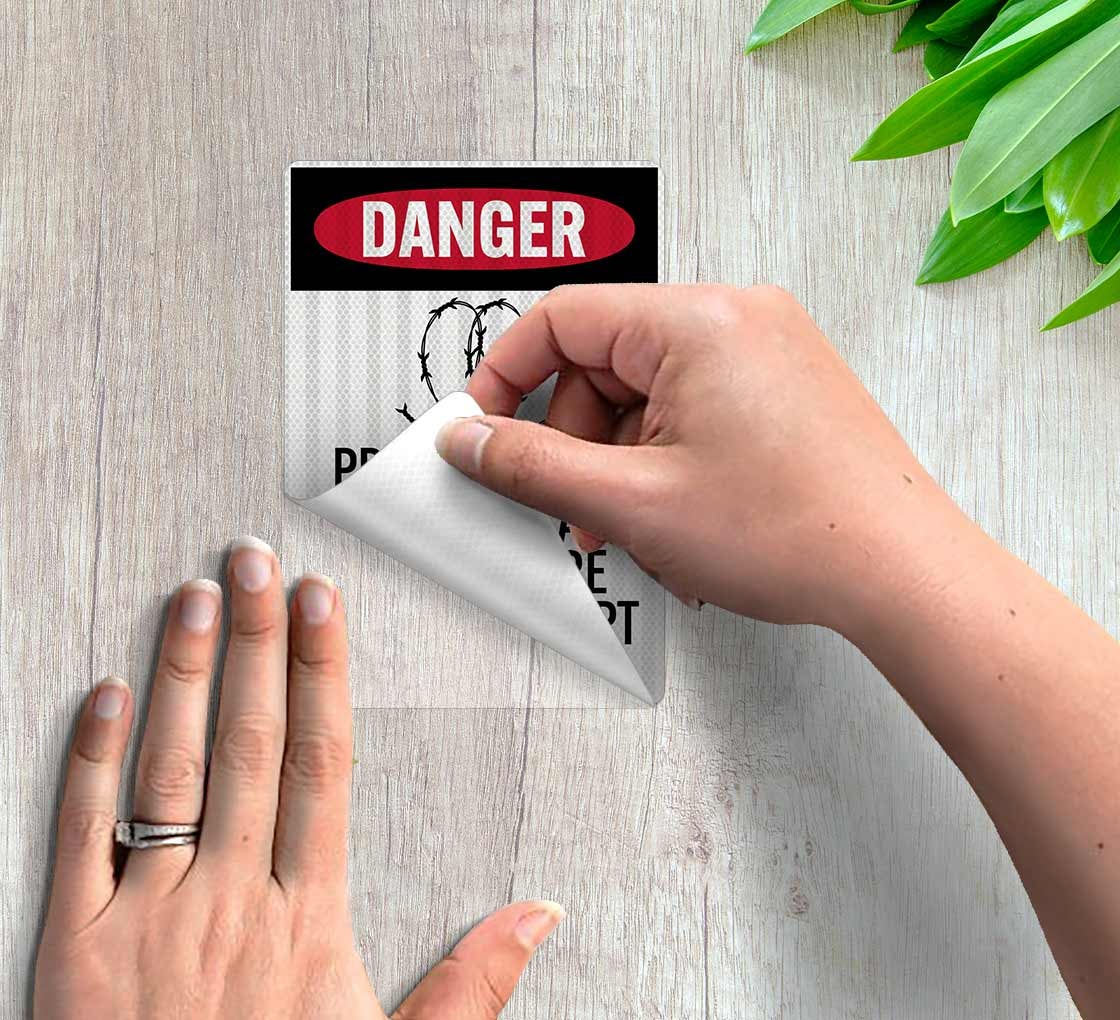 Shop for Protected By Razor Wire Decal (EGR Reflective) | BannerBuzz