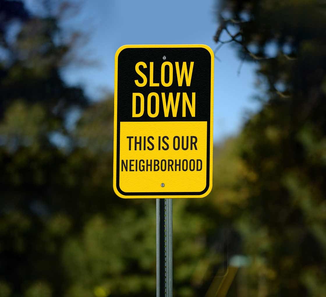 slow down sign