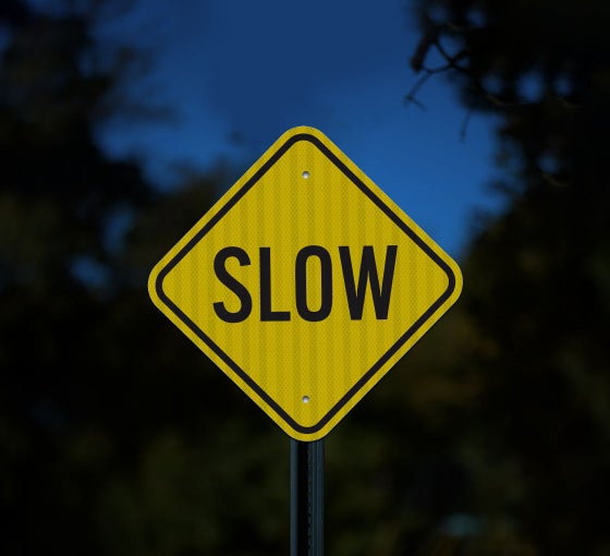 Yellow Slow Sign